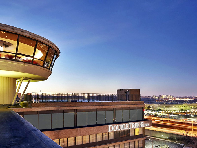 The Skydome's futuristic curves glow against twilight skies, promising dinner with a view that never gets old.