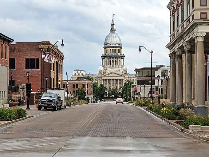 That magnificent capitol dome rising at street's end reminds you this city balances history with everyday living.