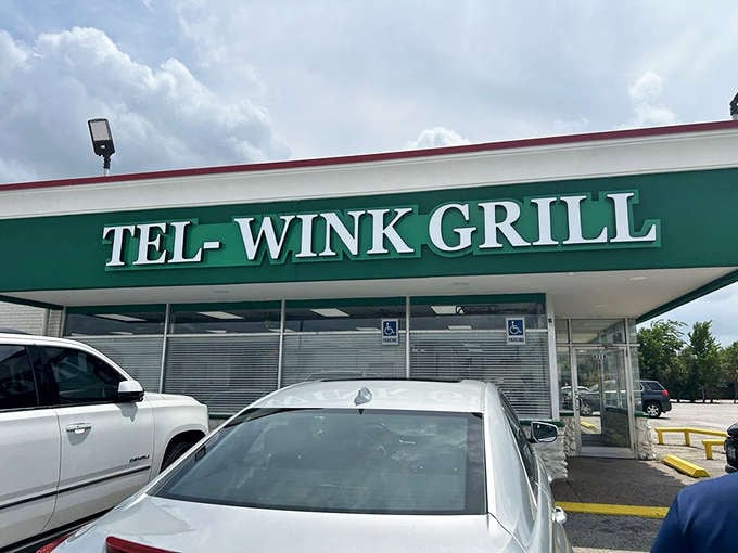 That green awning beckons like a beacon of hope for anyone craving real diner food without the fuss.
