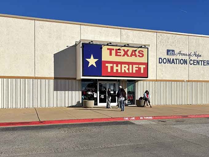 The Lone Star flag proudly announces bargains inside, where shopping feels like a true Texas-sized adventure awaits.