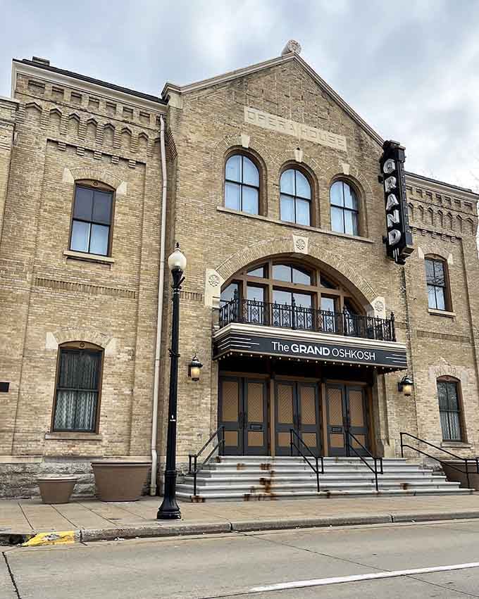 The Grand Oshkosh's beautiful brick facade and arched windows hint at the dramatic performances that have graced this historic stage.