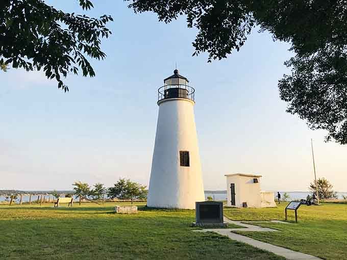 Standing sentinel in the golden hour, this classic lighthouse offers views that would make even Rockwell reach for his paintbrush.