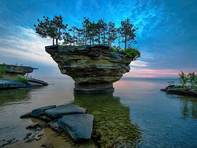 Mother Nature's balancing act looks like something from a Road Runner cartoon, except this rock actually defies gravity.
