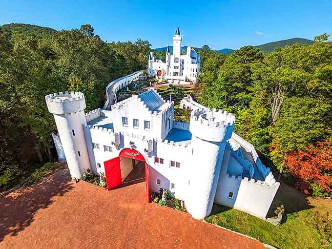 A fairytale castle with turrets and towers nestled in the mountains, because sometimes reality outdoes Disney's imagination completely.