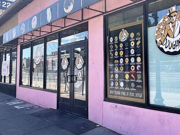 Pink building, black trim, and a dapper gentleman logo&mdash;this place has more style than a 1950s sock hop.