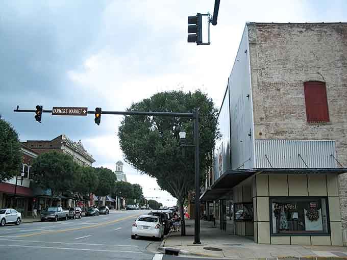 That Farmers Market sign overhead tells you everything: this is a town that still values gathering together daily.
