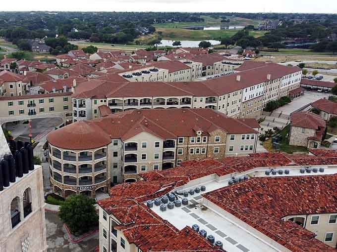 From above, those terracotta roofs spread out like someone airlifted a Croatian village to North Texas.