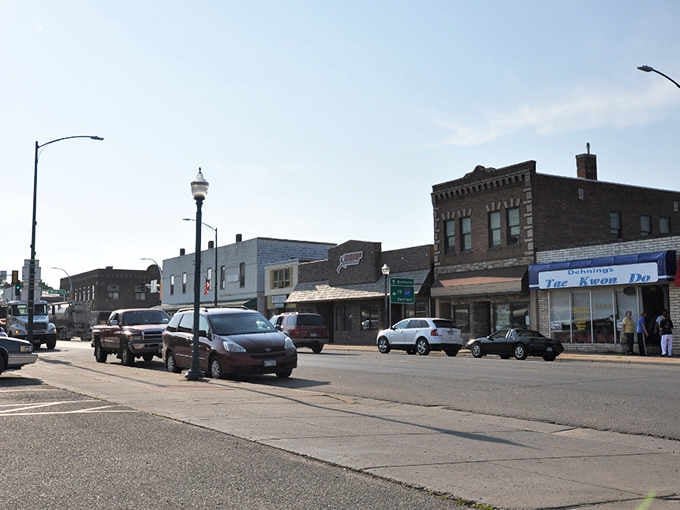 Brick buildings stand shoulder to shoulder like old friends, each one telling stories from decades of community life.