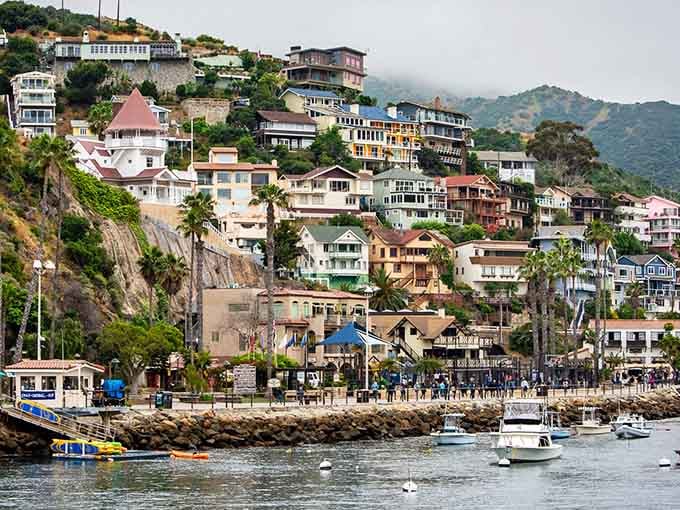 Hillside homes stack like a Mediterranean dream, creating a charming waterfront village that feels worlds away from everyday life.