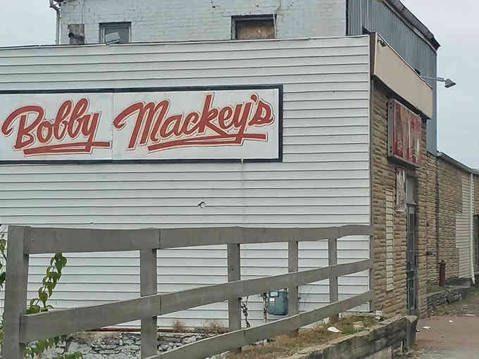 Behind those weathered stone walls and simple white siding lies a music venue with more drama than a soap opera.
