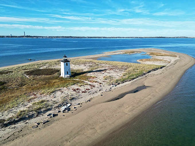 From above, this tiny lighthouse looks like a toy guarding its own private sandbar in the sparkling Atlantic.
