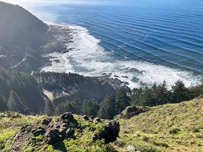 The Pacific stretches endlessly here, waves rolling in like they've been doing this dance since the beginning of time.