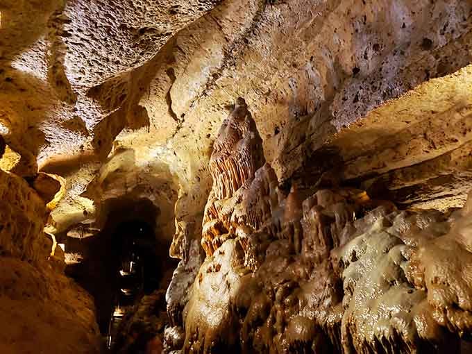 Nature's chandelier shop, where stalactites hang like frozen honey and every corner reveals another geological treasure.