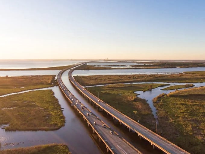 Golden hour transforms this marshland crossing into something resembling a postcard your neighbors won't believe is real.