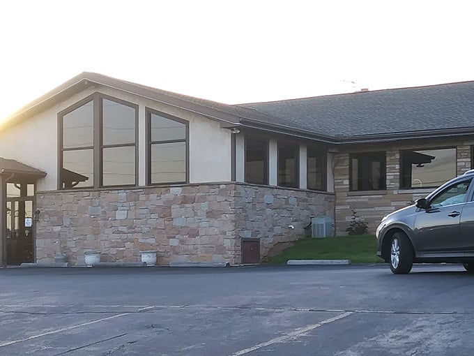 Those big windows let in natural light while you enjoy your meal, creating the perfect dining atmosphere inside.