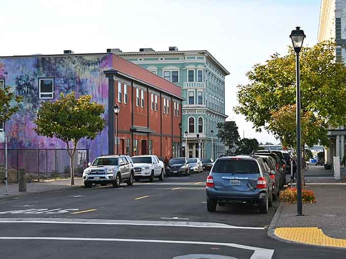 Tree-lined streets and colorful murals create an artistic vibe that feels both historic and welcoming today.