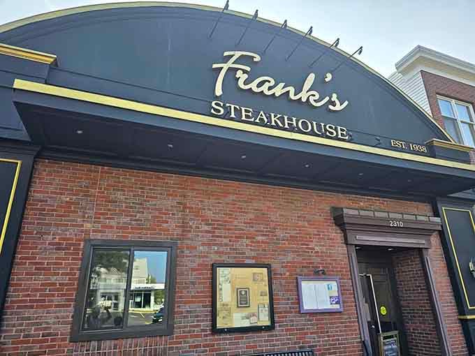 The curved awning and vintage lettering whisper old-school charm, where tradition matters more than trendy Instagram moments.