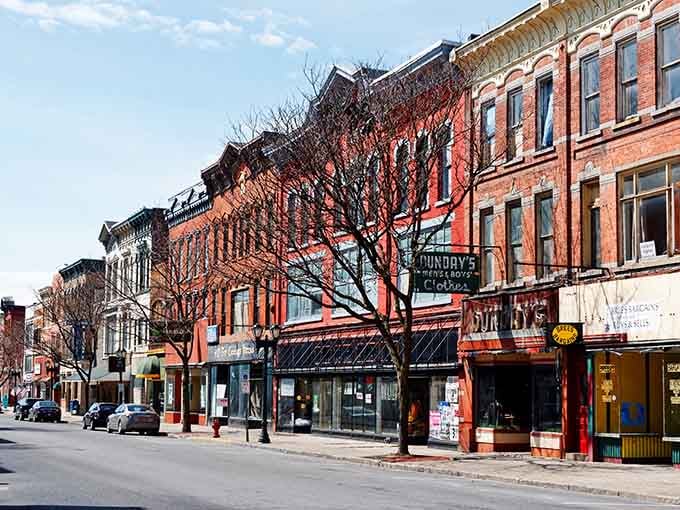 Red brick storefronts line the street in a colorful parade of local businesses that have weathered decades with grace.