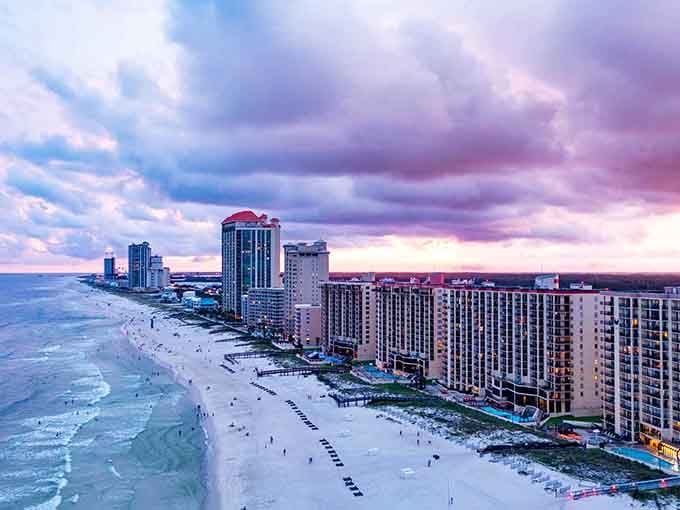 When the sky turns cotton candy colors at sunset, you'll understand why people never leave this beach.