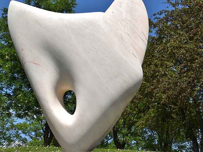 Smooth white curves rise from the earth, creating organic shapes that invite contemplation and countless photo opportunities.