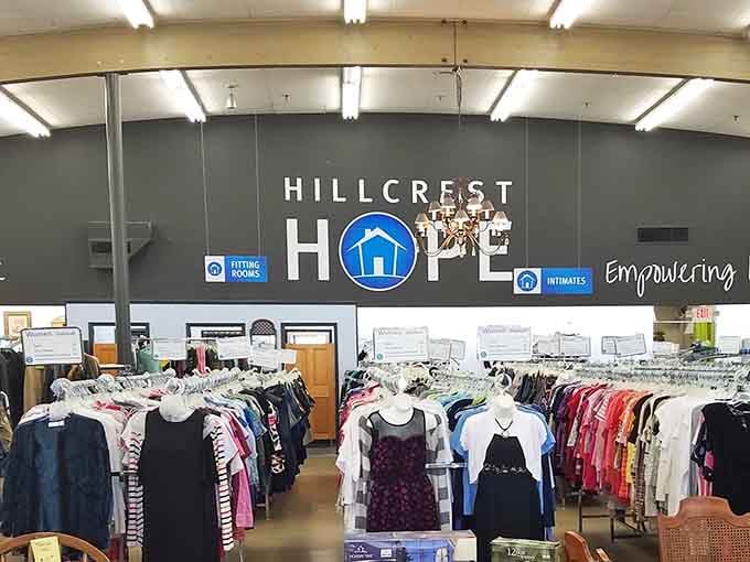 Inside, organized racks create a rainbow of possibilities where every hanger holds potential for someone's perfect find.