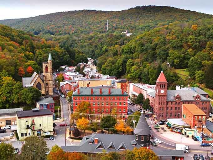 From above, Jim Thorpe reveals its secret: layers of colorful architecture nestled between peaks like a hidden treasure.