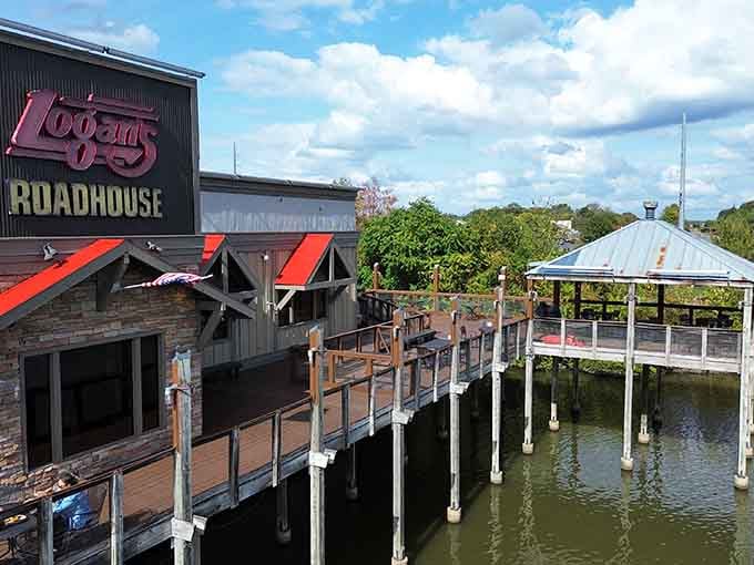That waterside deck stretching toward the horizon turns dinner into an adventure, like something from a vacation postcard.