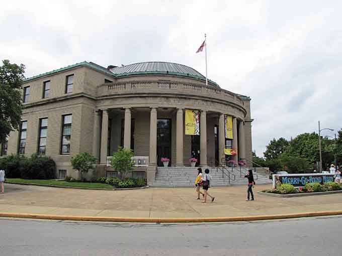Visitors stroll toward the entrance where history and whimsy blend together in unexpected, delightful ways.