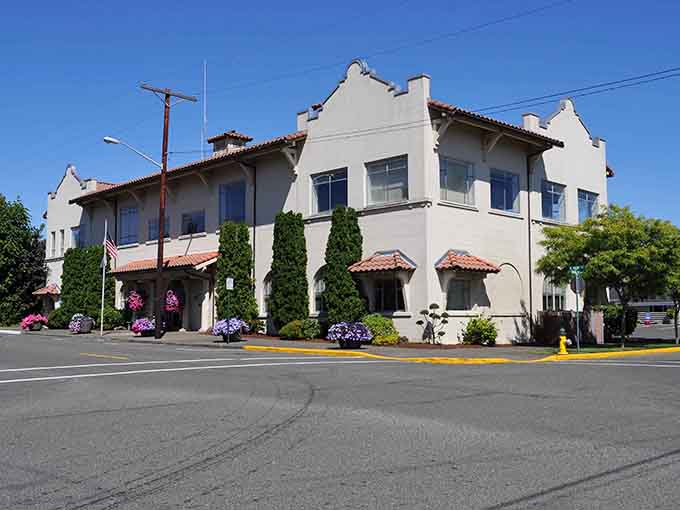 Spanish Colonial Revival elegance with terra cotta tiles reminds you that style exists beyond the big city limits.