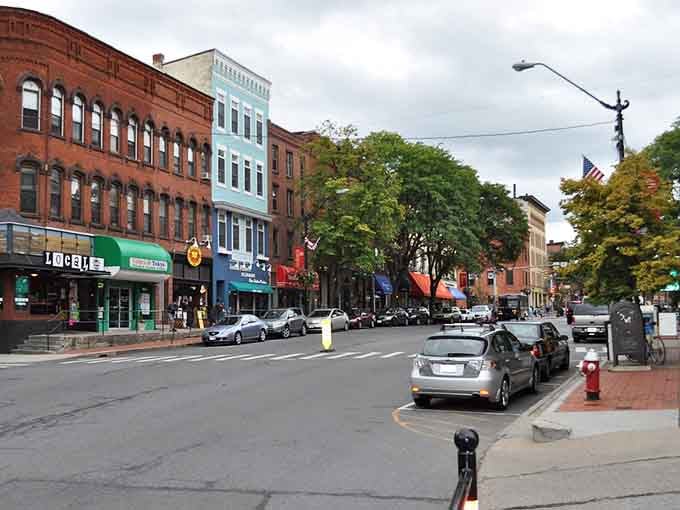 Colorful storefronts line streets where neighbors still stop to chat, not just scroll past each other's lives online.