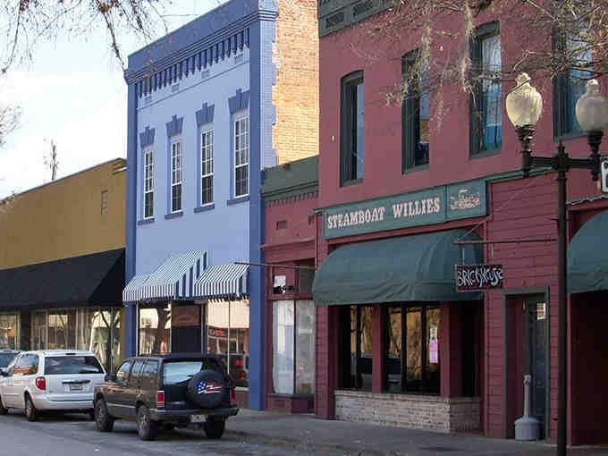Colorful storefronts line up like old friends, each one telling its own story of community and commerce.