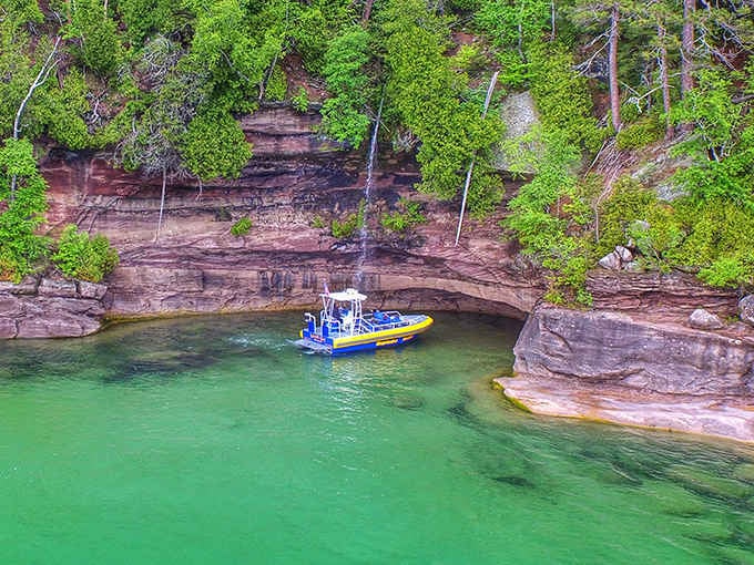 That water color seems impossible for the Midwest, yet here it is, glowing like liquid emerald beneath towering rock formations.