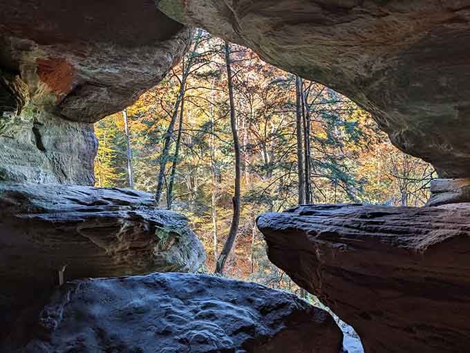 The rock frames autumn's glory like a picture window designed by Mother Nature herself.