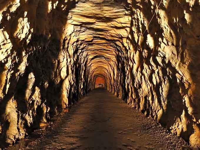 Golden light transforms this mountain passage into something magical, where every footstep echoes with stories from the past.