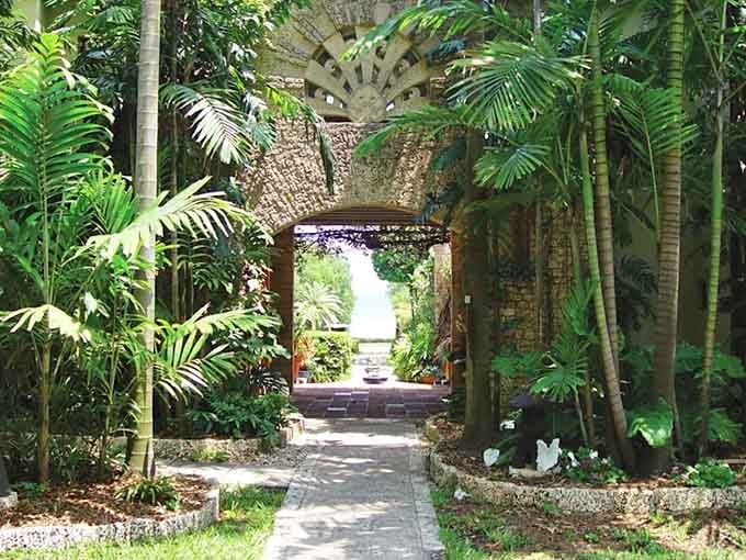 Every brick and vine tells a story in this lush garden that feels like a secret hideaway.