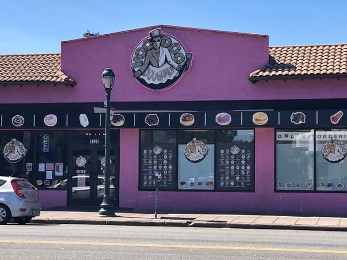 That purple facade and tile roof give off serious Mediterranean vibes, but with way better breakfast options inside.