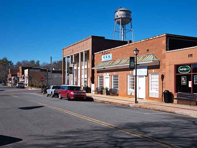 That iconic water tower watches over a main street that's kept its soul through decades of change.