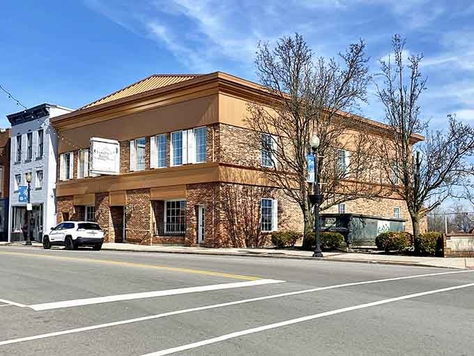 Modern meets historic where clean lines and traditional architecture share the same sunny downtown block beautifully.