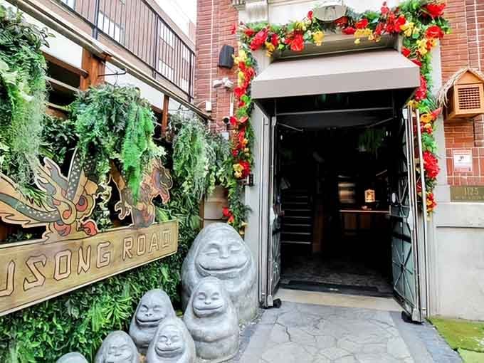 Those smiling stone guardians and vibrant flowers welcome you to an island escape hidden in Harvard Square.