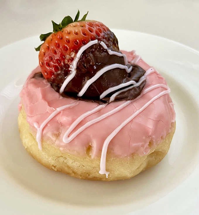When a donut needs a chocolate-covered strawberry on top, you know someone's stopped caring about restraint, bless them.