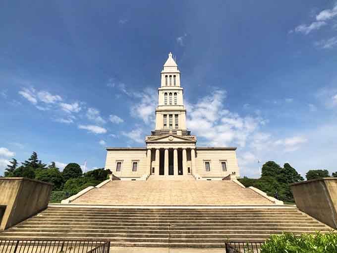 The George Washington Masonic National Memorial towers over Alexandria like a neoclassical exclamation point visible for miles around the region.