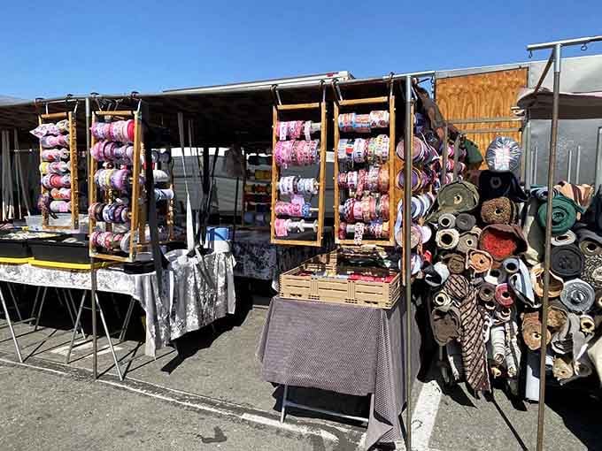 Ribbons and fabrics cascade like a crafting paradise where your Pinterest dreams finally become affordable reality.