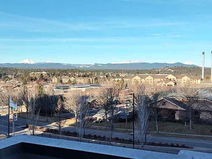 Those snow-capped peaks in the distance aren't a screensaver; they're your actual view from town every single day.