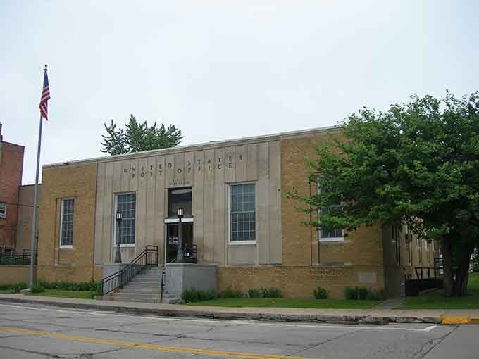 The post office building stands with that Depression-era dignity that modern architecture forgot how to achieve entirely.
