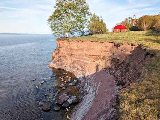 Standing on the edge of forever, where Lake Superior meets ancient rock and reminds you nature's the real boss.