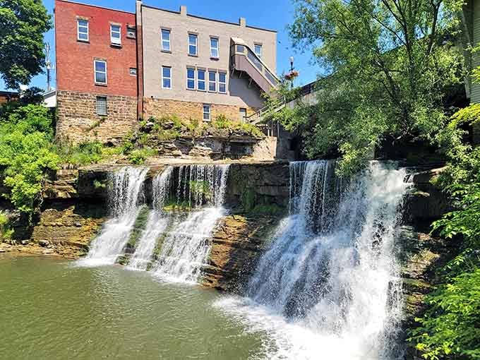 That's a legitimate waterfall casually hanging out between buildings like it pays rent here. Because why not?