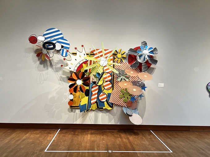 Contemporary art explodes off the wall in a riot of stripes and shapes that'd make Mondrian jealous.