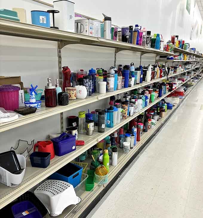 The water bottle aisle stretches into infinity like a hydration highway, proving someone's always upgrading their drink game.