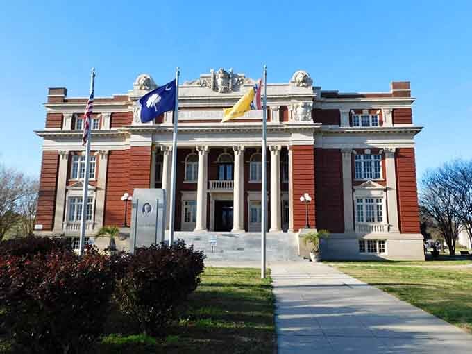 The Dillon County Courthouse commands attention like a Southern belle at her debutante ball, all columns and grace.