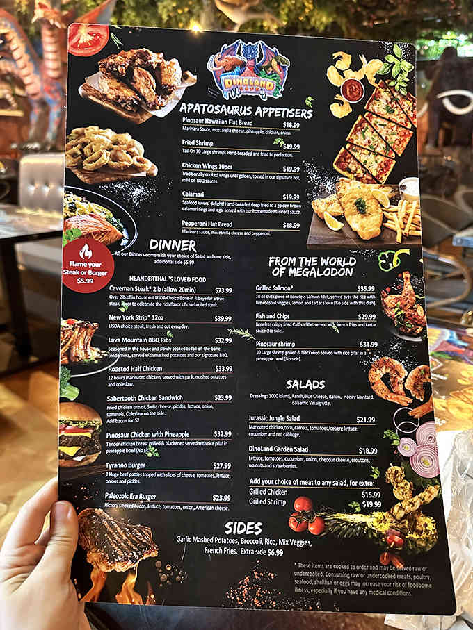 The menu features punny names like "Apatosaurus Appetizers" because someone understood that dinosaurs and wordplay go together perfectly.